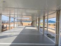 China Expandable Modular Container House with A1 Fire Rated Walls and Double-glazed Aluminum Curtain Wall for sale