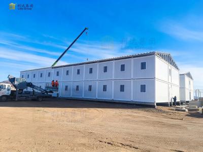 China 6000x3000x2800mm Flat Pack Container House with 12000 BTU Split Unit and A1 Fire Rating for Expandable Modular Container House Projects for sale