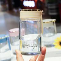 China Silicone Handle 165g 9.47oz Personalized Glass Water Bottle for sale