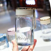 China Silicone Handle 165g 9.47oz Personalized Glass Water Bottle for sale
