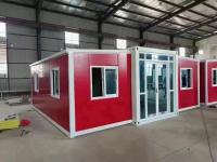 China Double Wing Folding Room Container House with Red Steel Door and Modern Design Styl for sale