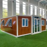 China 40ft Double-Wing Expansion Container House with Design and EPS Sandwich Panel Roof for sale