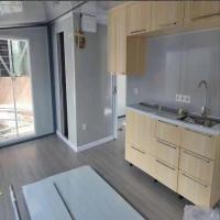 China Double Wing Expansion Container House Made of Eco-Friendly Materials and Steel Door for sale