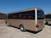 China 30 Seater Toyota Coaster Bus Japanese Mini Bus Open The Door Outside for sale