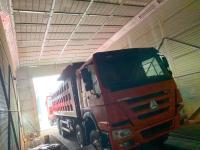 China Used Commercial Trucks HOWO Dump Truck 8*4 Right Steering 371hp Truck Body 7.3*2.45*1.5m for sale