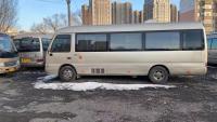 China Used Toyota Bus 23 Seats Front Engine Used Coaster Sealing Window Manual Transmission for sale