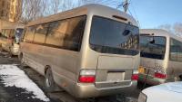 China Used Toyota Bus 23 Seats Front Engine Used Coaster Sealing Window Manual Transmission for sale