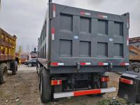 China Second Hand Tipper Trucks Black Color 371hp 8×4  HOWO ZZ3317 Flat Roof Cabin Rated Load 15.5t for sale
