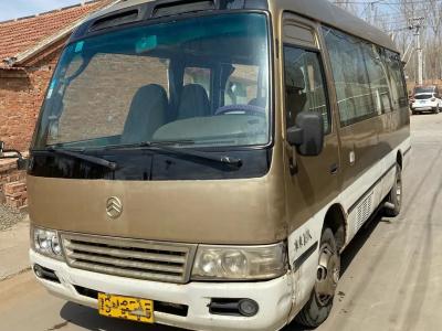 China Used Mini Coach External Swinging Door 19 Seats EURO III Front Engine Used Golden Dragon XML6601 for sale