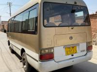 China Used Mini Coach External Swinging Door 19 Seats EURO III Front Engine Used Golden Dragon XML6601 for sale