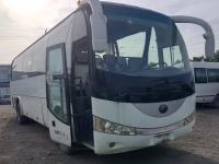 China 2nd Hand Coach 47 Seats Sealing Window Air Conditioner EURO III Yuchai Engine 10.5 Meters Young Tong ZK6100 for sale