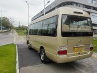 China Second Hand Coaster 6 Meters Front Engine 19 Seats Used Golden Dragon Minibus XML6601 External Swinging Door for sale