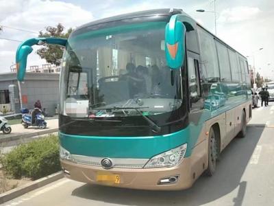 China Used Motor Coaches Green Color 36 Seats Middle Passenger Door Air Conditioner 2nd Hand Yutong Bus ZK6906 for sale