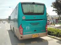 China Used Motor Coaches Green Color 36 Seats Middle Passenger Door Air Conditioner 2nd Hand Yutong Bus ZK6906 for sale