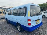China Used 12 Seater Minibus White And Blue Color 11 Seats Golden Dragon Hiace XML6532 Gasoline Engine LHD for sale