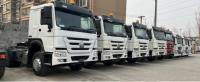 China Used Diesel Trucks White Color 6×4 Drive Model Weichai Engine 430hp 12 Gears Standard Cabin Howo Tractor for sale