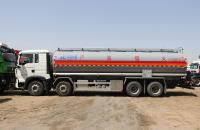 China Used Oil Container 30000 Liter Howo T5G Oil Tanker Truck 4 Axles Cab With Sleeper for sale