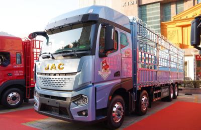 China Cargo Truck Used 8*4 JAC Fence Box 560hp Cummins Engine ZF Gearbox High Roof Cab for sale