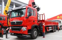 China 8x4 Truck Crane Mounted Chinese Brand Howo 350hp Weichai Engine XCMG Arm Strong Power for sale