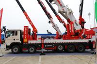 China 100 Ton Truck Mounted Crane Howo 10*4 Chassis 440hp Knuckle Arm Crane 135 Tons Lifting for sale