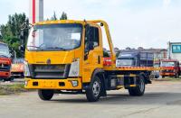 China Flat Bed Car Trailer Trucks Howo 4*2 Small Towing Truck Single Cab Loading 2 Tons LHD/RHD for sale