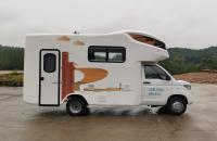 China Box Truck Container Wuling Motor Home Car 5.8 Meters With Toilet Comfortable Bed And Sofa for sale