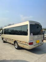 China Toyota Coaster 20-Seat Electric Chinese-Door China IV Champagne Gold Medium-Sized Business Bus for sale