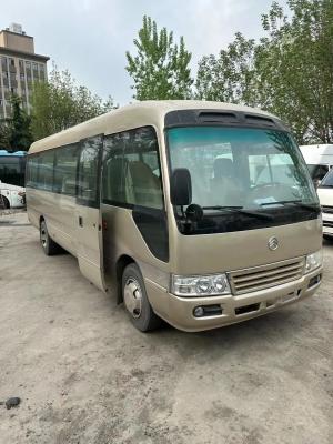 China XML6770 28-Seater 7.7-Meter Golden Dragon Second-Hand Medium Bus Champagne Gold Front Engine for sale