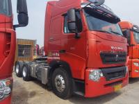 China Sino Tractor Truck Head Red Color 6×4 Drive Mode Leaf Spring One Row With Sleeper LHD for sale