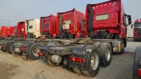 China Sino Tractor Truck Head Red Color 6×4 Drive Mode Leaf Spring One Row With Sleeper LHD for sale