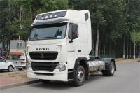 China Half-Seat Row HOWO T7H Heavy Truck High Roof Deflector Side Wind Panel 440 HP 4X2 LNG Tractor for sale