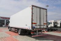 China Diesel 10-Speed 290hp 4X2 9.45m Deflector Row Half Cab White Body SITRAK ZZ5186 Three-Door Freight Refrigerated Truck for sale