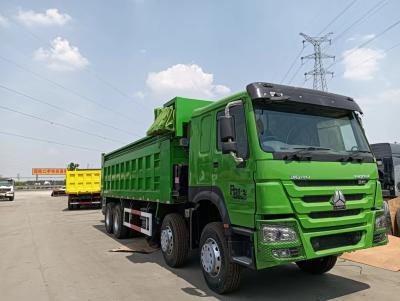 China Used Dumper Trucks Use In Zimbabwe Sinotruk Howo Leaf Spring 30CBM Box Right Hand Drive for sale