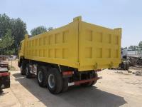 China Used Howo Dump Truck 371hp 8x4 Left Hand Drive Diesel WP Engine AC 12 Wheels for Zimbabwe for sale