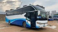 China 55 Seats 6 Tire 6050mm Wheelbase Used Yutong Buses Left Hand Drive Nude Packing Double Doors with ABS for sale