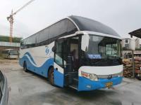 China 55 Seats 6 Tire 6050mm Wheelbase Used Yutong Buses Left Hand Drive Nude Packing Double Doors with ABS for sale