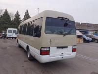 China Used Toyota Bus Coaster 20 Seats Gasoline Left Hand Drive Used Passenger Bus Low Kilometer for sale
