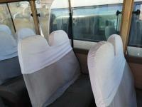 China Diesel Engine 1HZ 23-29seats Left Hand Drive Low Kilometer Used Passenger Bus Used Coaster Bus Japanese Brand Coaster for sale
