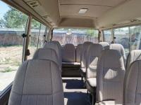 China Used Toyota Coaster 17-30 Seater Luxury Seats Desks Gasoline LHD 2017 Made in Japan for sale