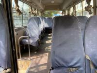 China Used Toyota Coaster Mini Bus in 2011 year Used Diesel Manual Operated Door Buses Used Luxury Bus with 23 Seats for sale