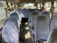 China Used Toyota Coaster Mini Bus in 2011 year Used Diesel Manual Operated Door Buses Used Luxury Bus with 23 Seats for sale