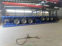 China New Tri-Axle  40 Tons  Foot Container Chassis Flatbed Semi Trucks Trailer for sale