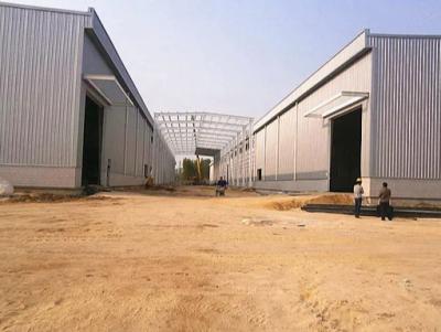 China Q235B Q355B Economical Steel Structure Warehouse Prefabricated Steel Buildings for sale