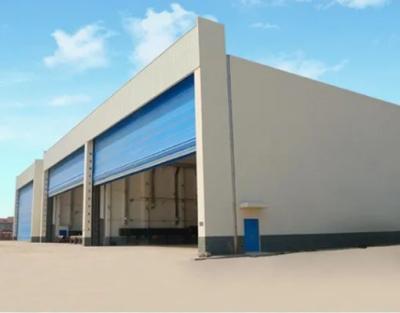 China Commercial Design Steel Structure Frame Clear Span Warehouse Hangar for sale