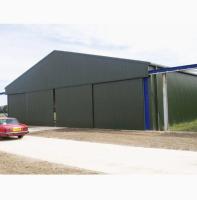 China Industrial Cost-Effective Prefab Metal Light Storage Warehouse Steel Structure Building Frame for sale