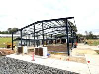 China Prefabricated Steel Warehouse Prices Sheds Storage Outdoor Industrial Steel Warehouse Construction Material for sale