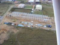 China Quick Built Prefabricated Steel Warehouse with Q355 Welded H Section Steel and Wind Load Up to 300 km/h for sale
