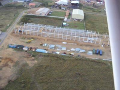 China Quick Built Prefabricated Steel Warehouse with Q355 Welded H Section Steel and Wind Load Up to 300 km/h for sale