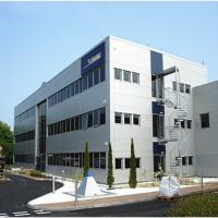 China 300 km/h Wind Load Rating Steel Structure Building with ±0.5mm Processing Precision and C/Z Galvanized Steel Purlin Prefabricated Steel Building for sale
