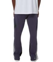 China Small Order Clothing Manufacturers Men'S Splashed Paint With Hole Drawstring Flared Sweatpants for sale